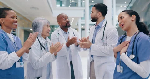 Doctors, group of people and applause fo... | Stock Video | Pond5