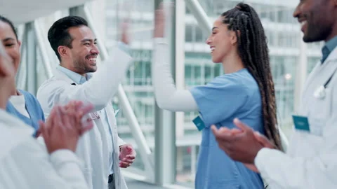 Doctors, nurses and high five, success a... | Stock Video | Pond5