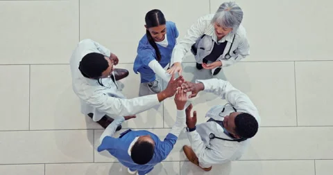Doctors, nurses and high five for health... | Stock Video | Pond5