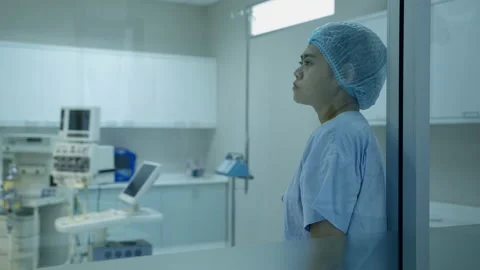 Doctors or nurses in the operating room ... | Stock Video | Pond5