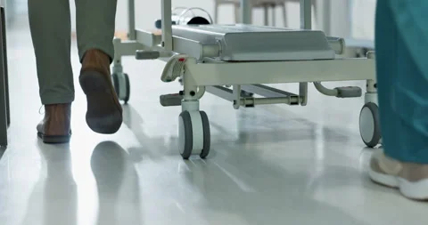 Doctors, patient and push hospital bed t... | Stock Video | Pond5