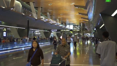DOHA, QATAR - MAY 10, 2019: Passengers m... | Stock Video | Pond5