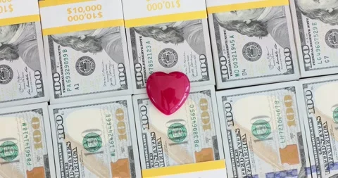 Dollar bills represent high cost of hear... | Stock Video | Pond5