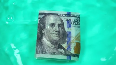 Drowning Money Stock Video Footage | Royalty Free Drowning Money Videos ...