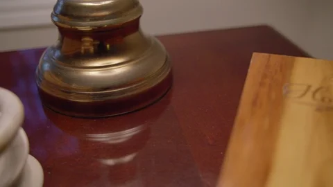 Dolly across wooden book box on table la... | Stock Video | Pond5