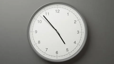 Dolly In Clock Face on Dark Grey Office ... | Stock Video | Pond5