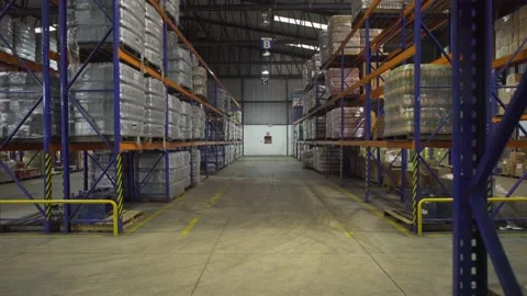 Dolly in of Rows of shelves with boxes I... | Stock Video | Pond5