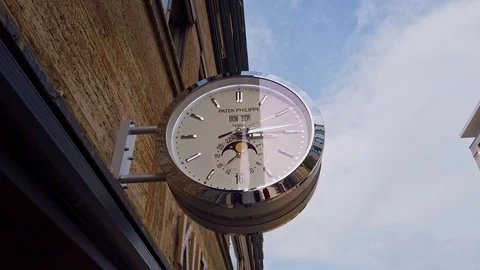 Dolly in shot of the Patek Philippe cloc... | Stock Video | Pond5