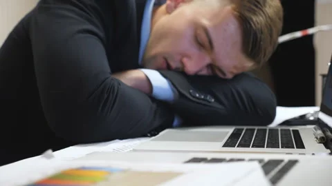 Dolly shot to tired boss in formal suit ... | Stock Video | Pond5