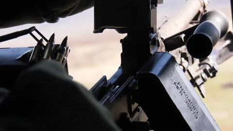Door gunner positioning machine gun from... | Stock Video | Pond5