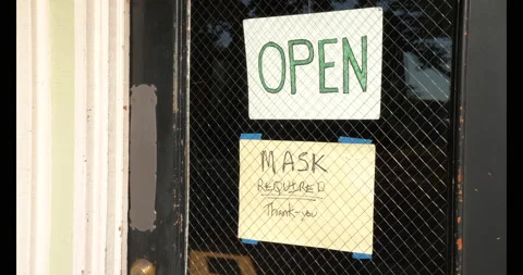 Door with open sign and mask required si... | Stock Video | Pond5