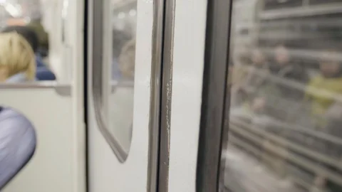 Doors of moving train vagon with people ... | Stock Video | Pond5