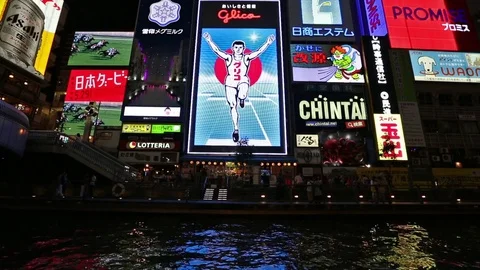 Dotonbori district with famous Glico man... | Stock Video | Pond5
