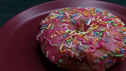 Doughnuts That Rotate 360 Degrees on the... | Stock Video | Pond5