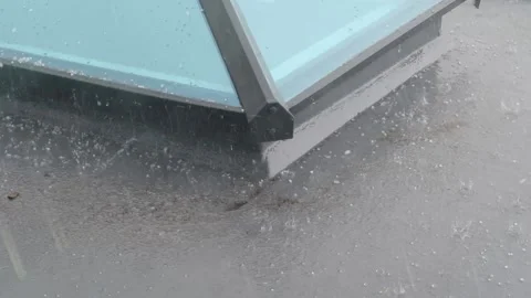 Downpour of heavy rain droplets and hail... | Stock Video | Pond5