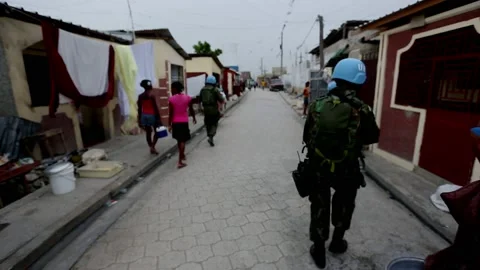 DPKO soldiers from UN walking in streets... | Stock Video | Pond5