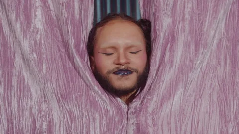 Drag Queen Peeking Through Stage Curtain... | Stock Video | Pond5