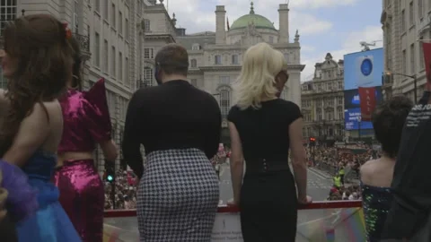 DRAG QUEENS ON DOUBLE DECKER BUS WAVING ... | Stock Video | Pond5