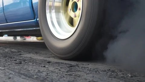 Drag racing car burn tire at start line | Stock Video | Pond5