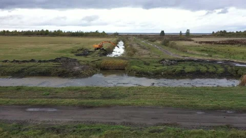 Drainage of agricultural land. Dredging ... | Stock Video | Pond5