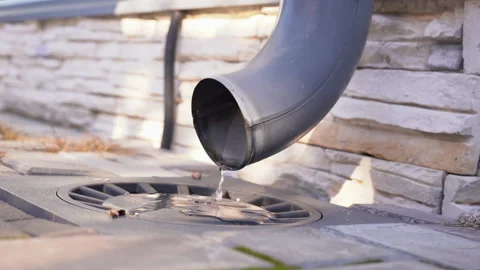 Drainage pipe. Rain water flowing from p... | Stock Video | Pond5