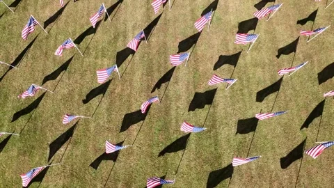 Dramatic shadows of American flags blowi... | Stock Video | Pond5