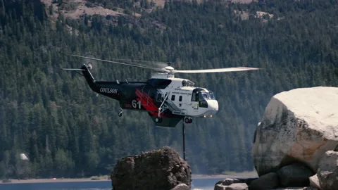 Dramatic view of Helicopter Water Tanker | Stock Video | Pond5