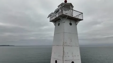 Dramatic view of historic Sodus Bay Ligh... | Stock Video | Pond5