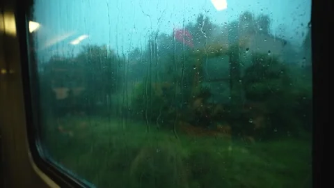 Train Window Rain Stock Footage ~ Royalty Free Stock Videos | Pond5