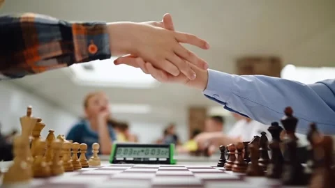 A draw in a chess game. Players shake ha... | Stock Video | Pond5