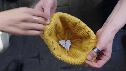 Draw lots with folded pieces of paper in... | Stock Video | Pond5