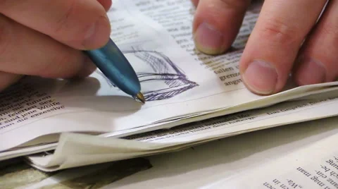 draw, make a sketch of a newspaper | Stock Video | Pond5