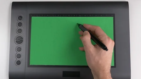 Drawing on a Graphic Tablet With a Green... | Stock Video | Pond5