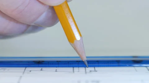 Drawing a pencil line on the ruler on th... | Stock Video | Pond5