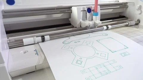 A drawing plotter draws a schematic of i... | Stock Video | Pond5