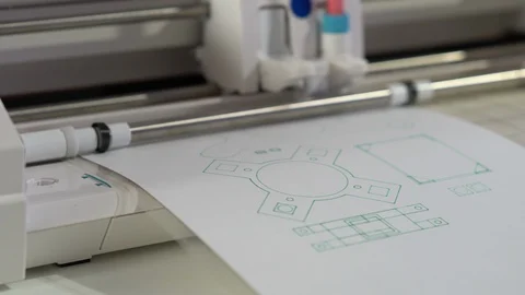 A drawing plotter draws a schematic of i... | Stock Video | Pond5