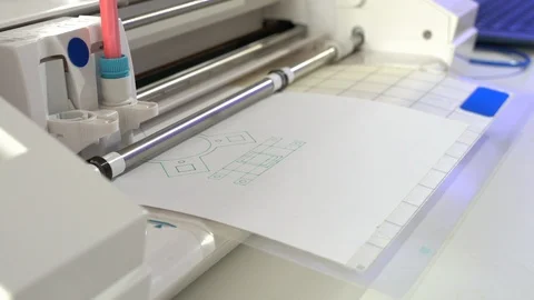A drawing plotter draws a schematic of i... | Stock Video | Pond5