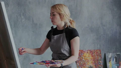 Drawing process: talented skilled blonde... | Stock Video | Pond5