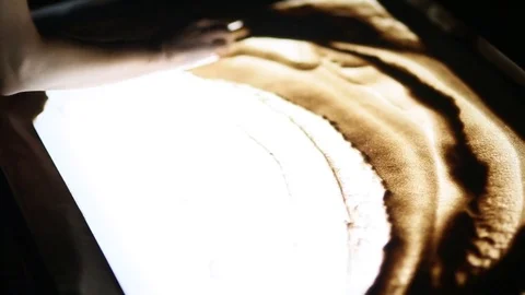 Drawing with sand. Short show. Drawing s... | Stock Video | Pond5