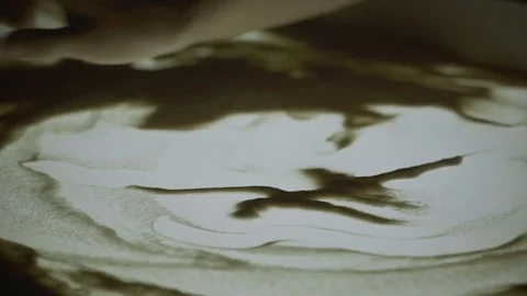 Drawing with sand. Short show. Drawing s... | Stock Video | Pond5