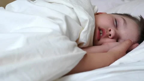 dreamy kid sleep with open mouth. little... | Stock Video | Pond5