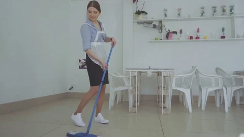 Girl Cleaning Floor Stock Footage ~ Royalty Free Stock Videos | Pond5