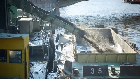 Dredging River : Crane scoops sand and m... | Stock Video | Pond5