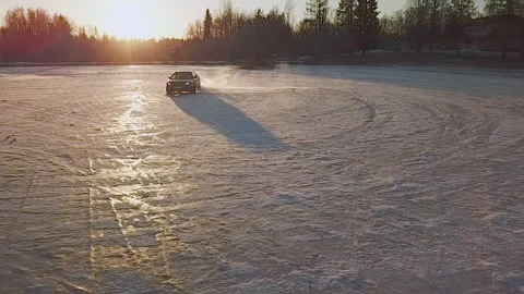 The drifting car on the ice track on an ... | Stock Video | Pond5