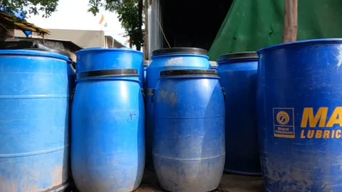 Drinking water filled in blue containers... | Stock Video | Pond5