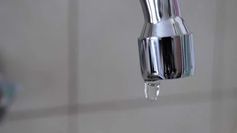 Dripping faucet, waste of water. Slow mo... | Stock Video | Pond5