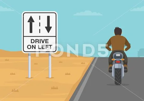 "Drive on left" traffic sign for tourist drivers. Back view of a moto ...