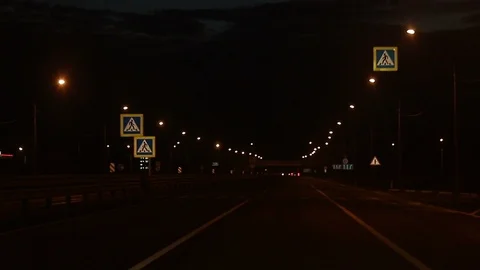 Drive at night on highway road signs ref... | Stock Video | Pond5