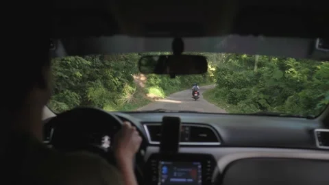 Driver seat view driving a car on a smal... | Stock Video | Pond5