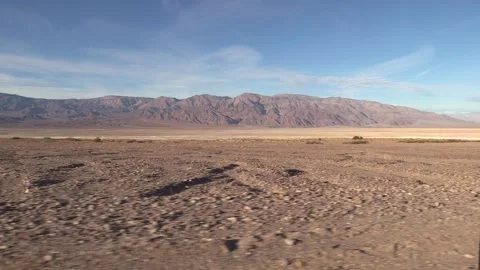 Driving in Car Barren Empty Desert Lands... | Stock Video | Pond5